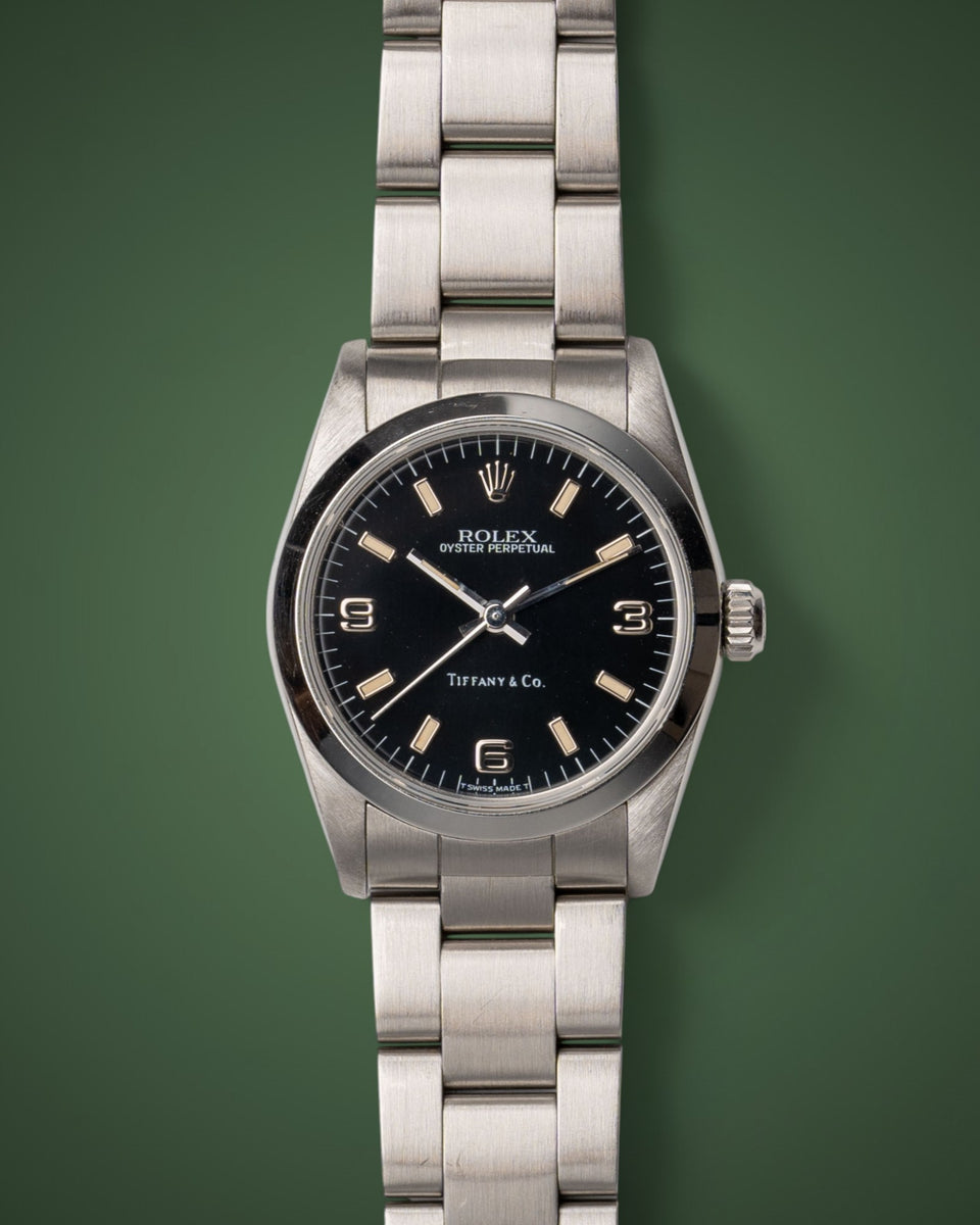 Rolex Oyster Perpetual 67480 31mm Tiffany Double Stamp – Classic Time Club